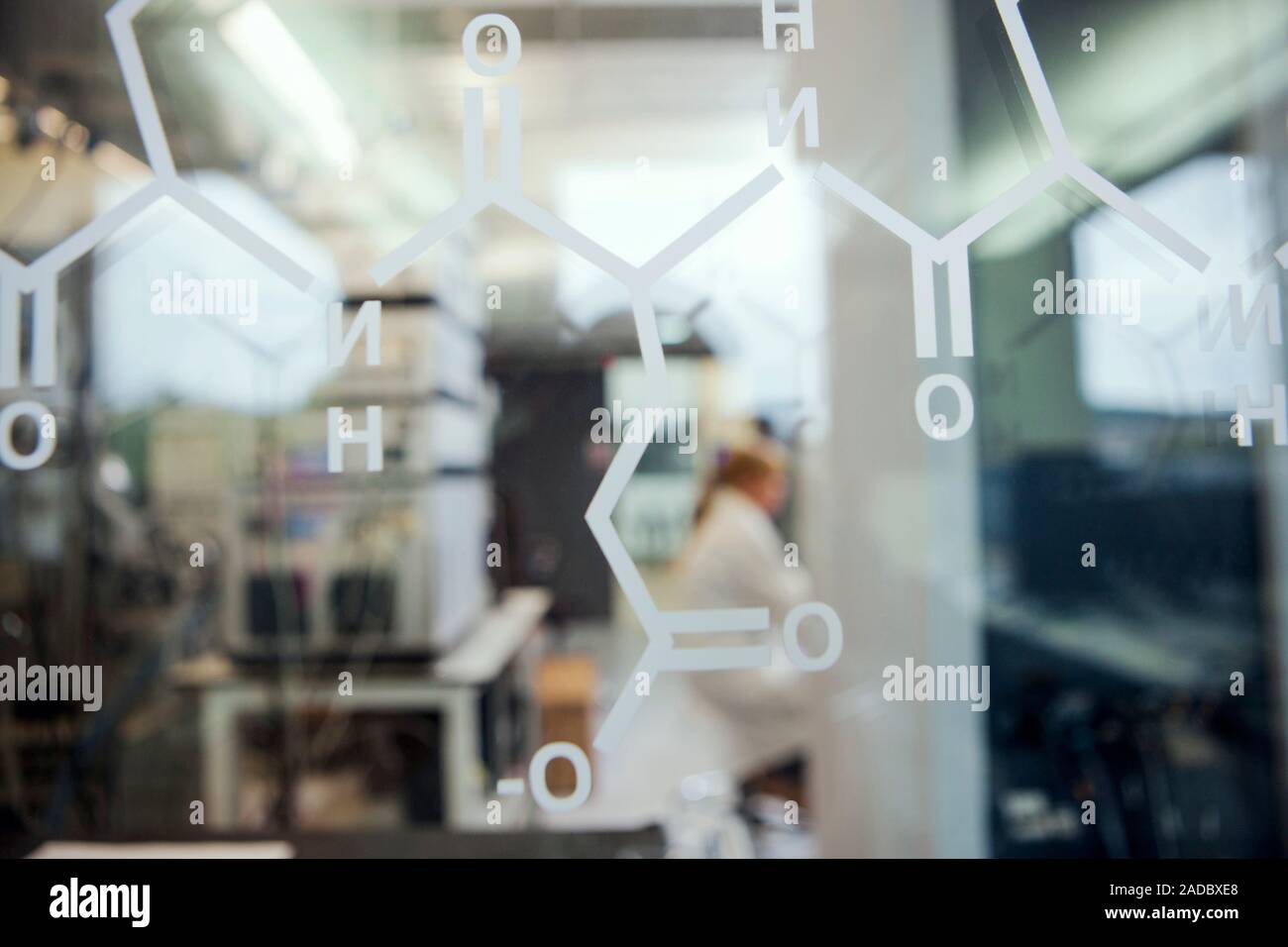 Proteomics research. Protein structures on a wall in a laboratory where ...