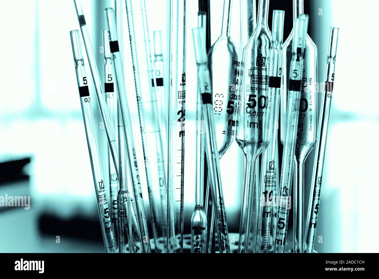 Pipettes in laboratory Stock Photo - Alamy