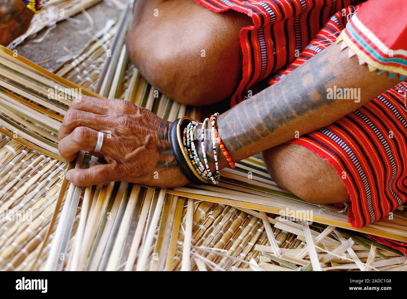 Detail of a Manobo woman's arm tattoos. These markings were applied ...