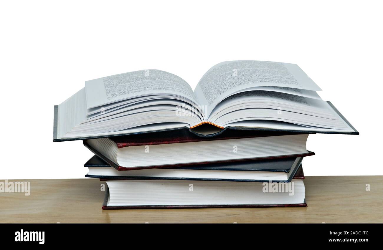 Open book and pile of books isolated on white background Stock Photo ...