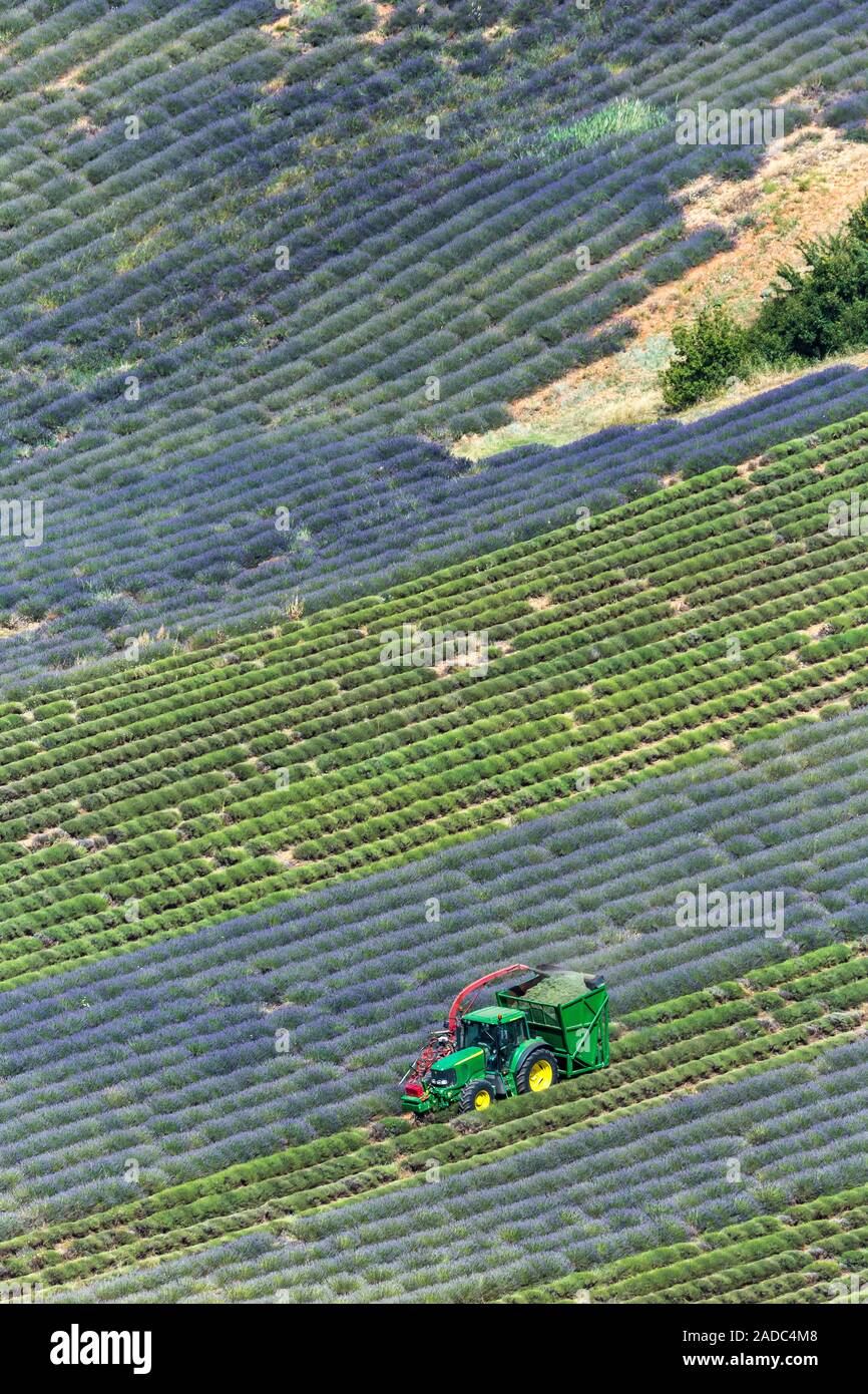 This tractor and hopper combination is more versatile on these steep ...