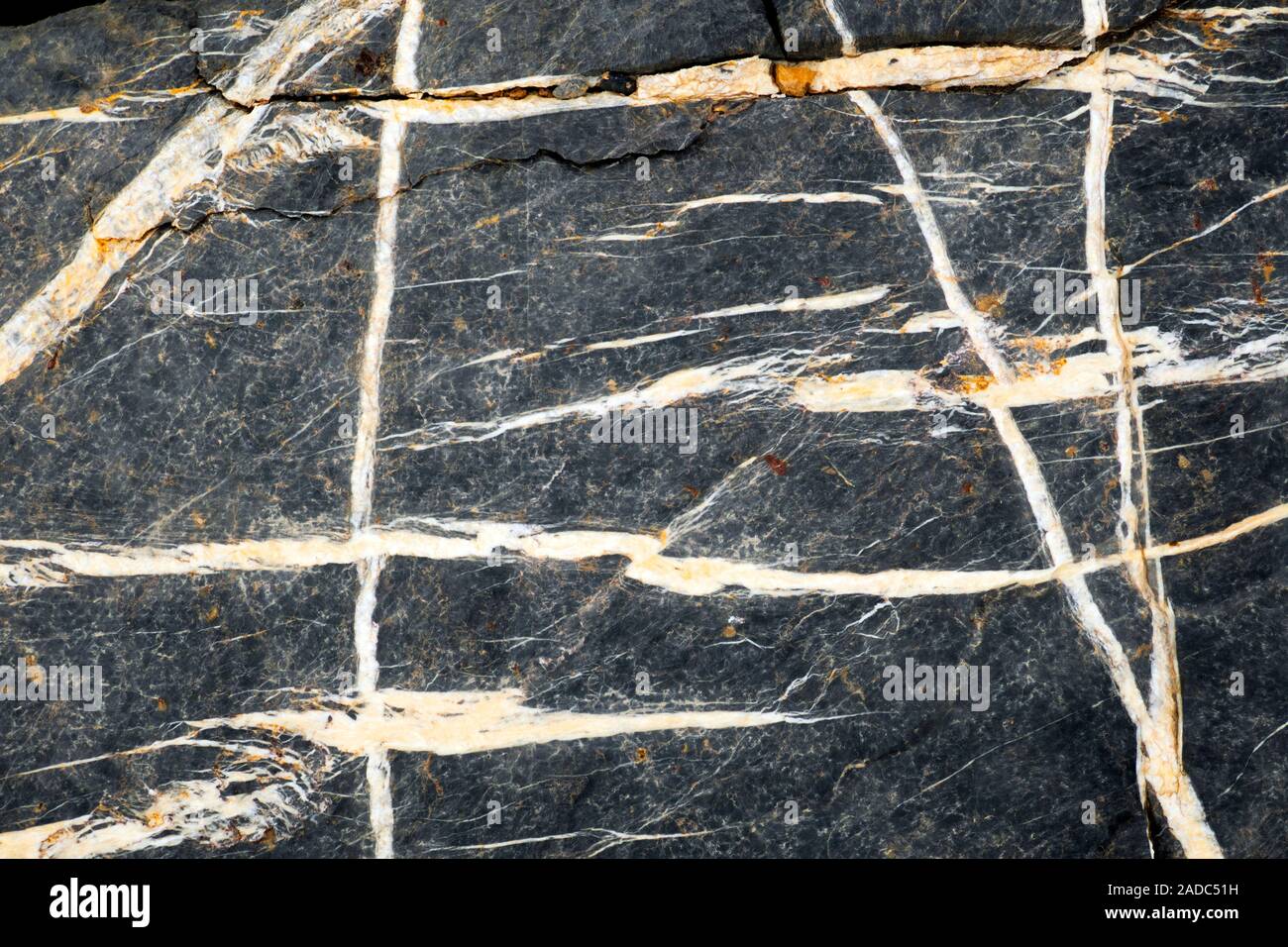 Veins in rocks are a result of the precipitation and/or crystallisation ...