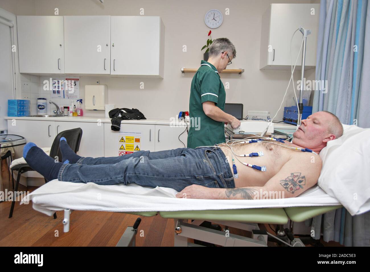 Electrocardiography test. Paramedic at a general practice (GP) clinic ...