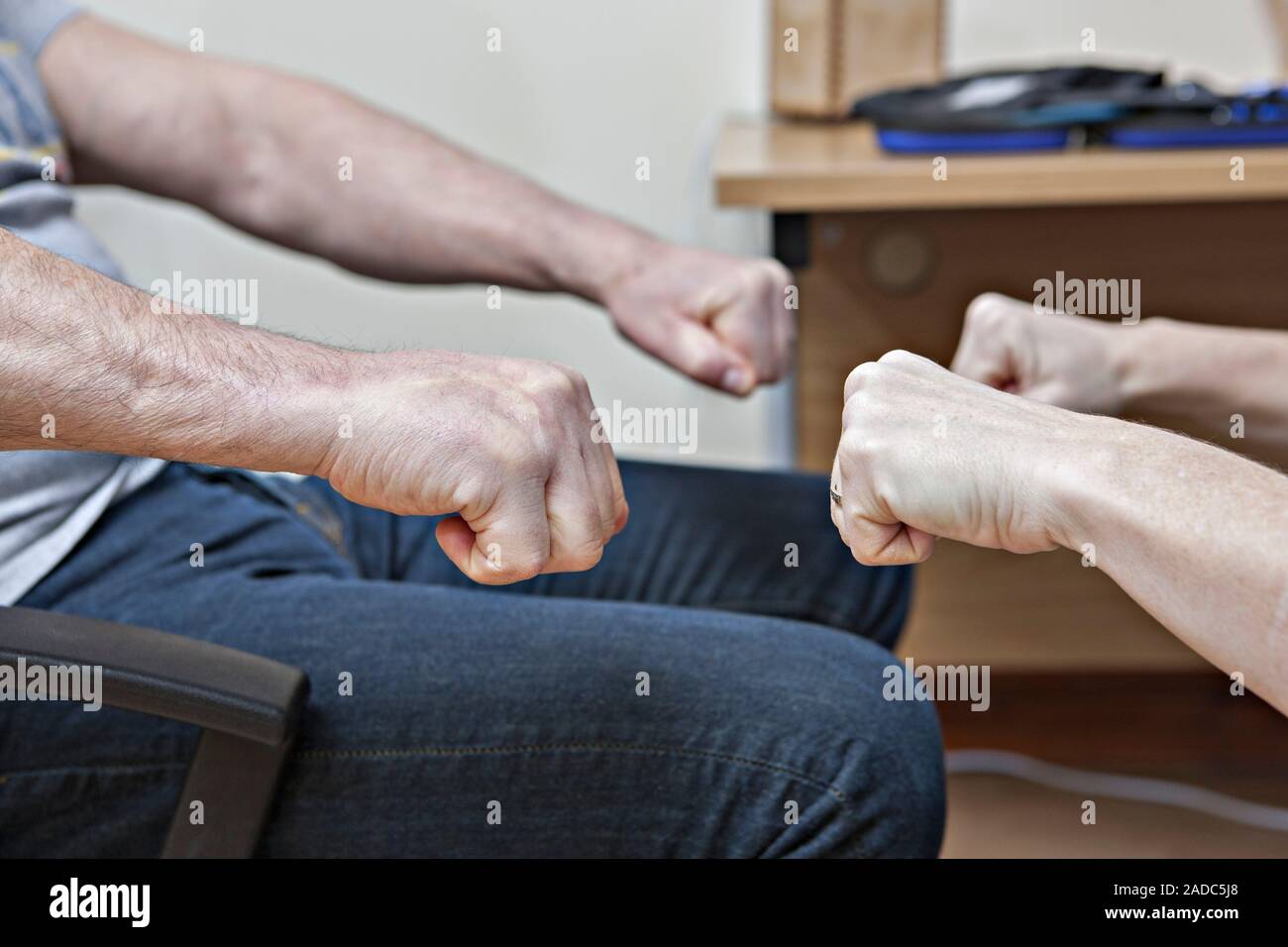 Carpal tunnel syndrome assessment. Medical practitioner assessing the ...