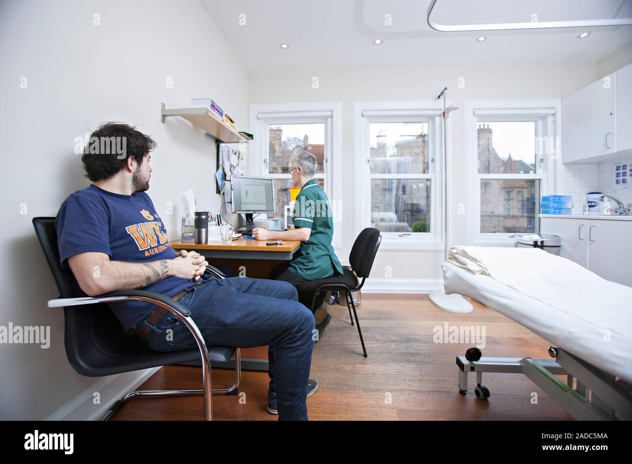 Medical consultation at a general practice (GP) clinic. The patient is ...