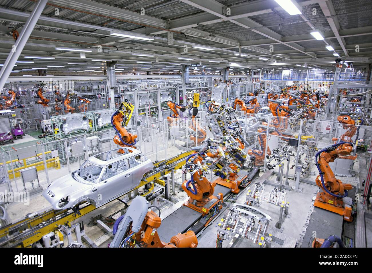 Mini car factory. Mini on the robotic assembly line at BMW's Plant ...