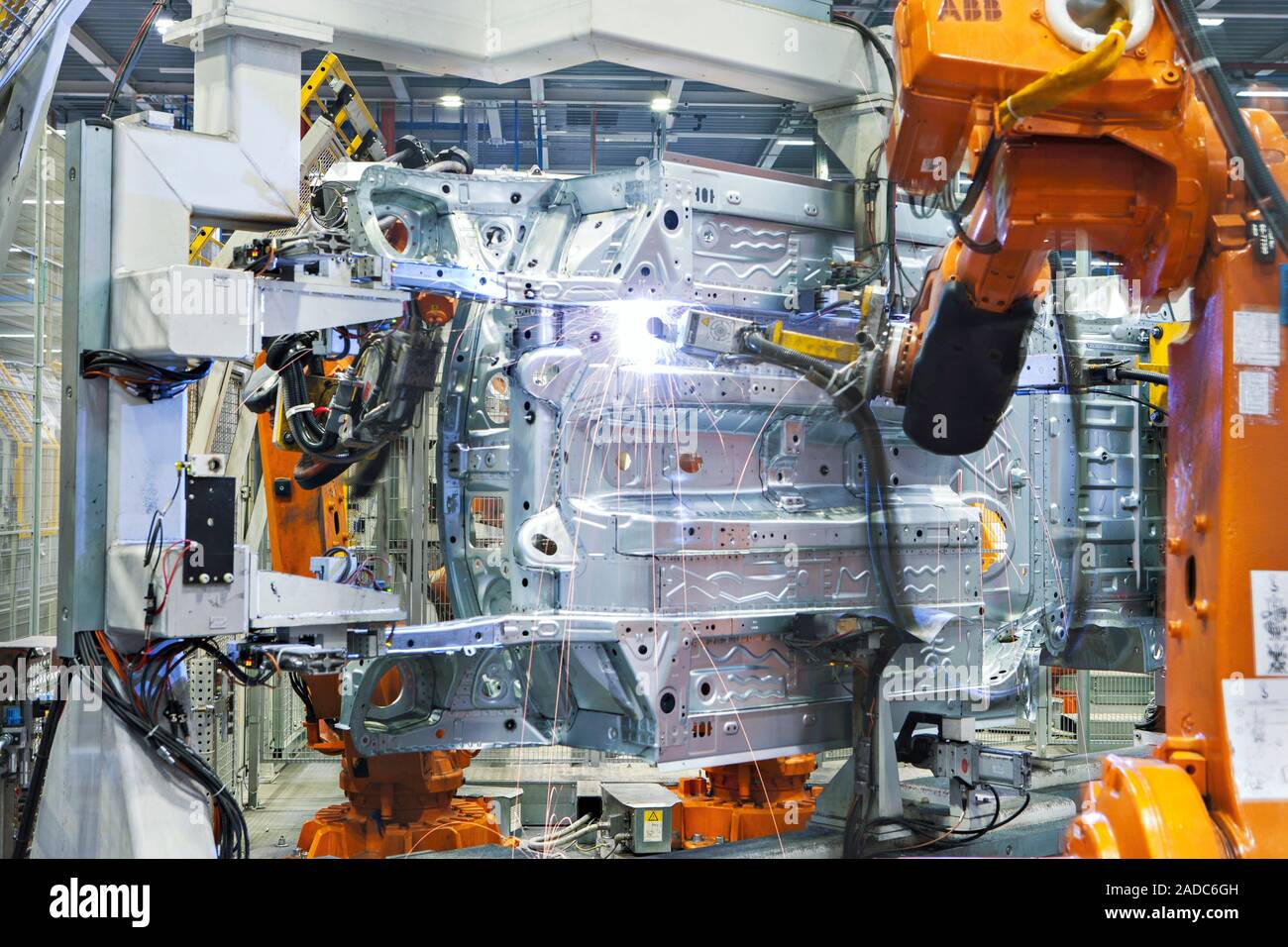 Mini car factory. Mini on the robotic assembly line at BMW's Plant ...