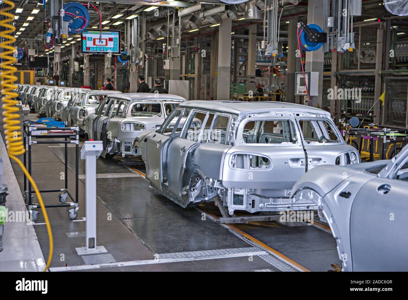 Mini car factory. Completed Mini body shells on their way to the next ...