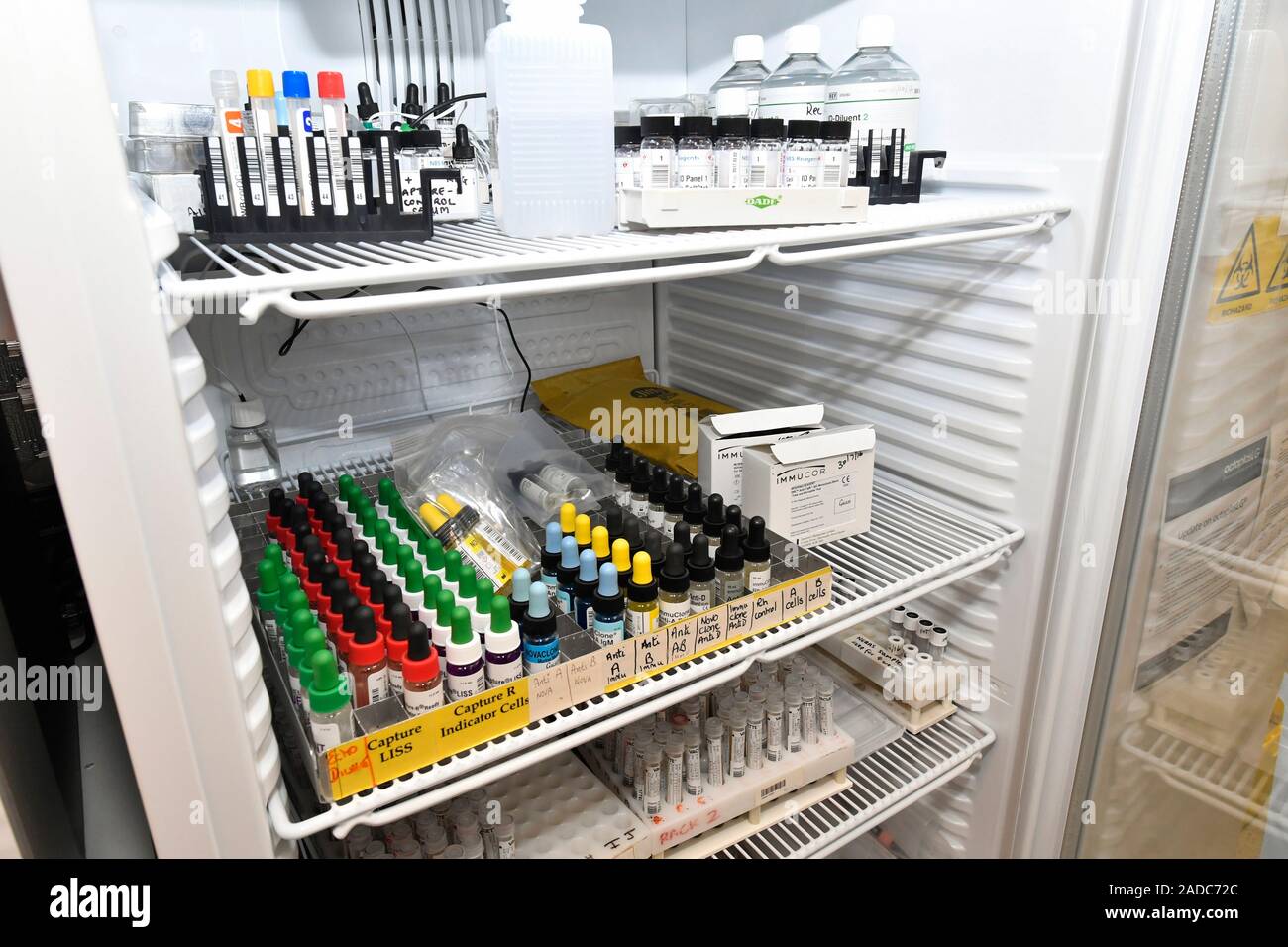 Haematology reagents and chemicals in a fridge in a laboratory. Blood ...