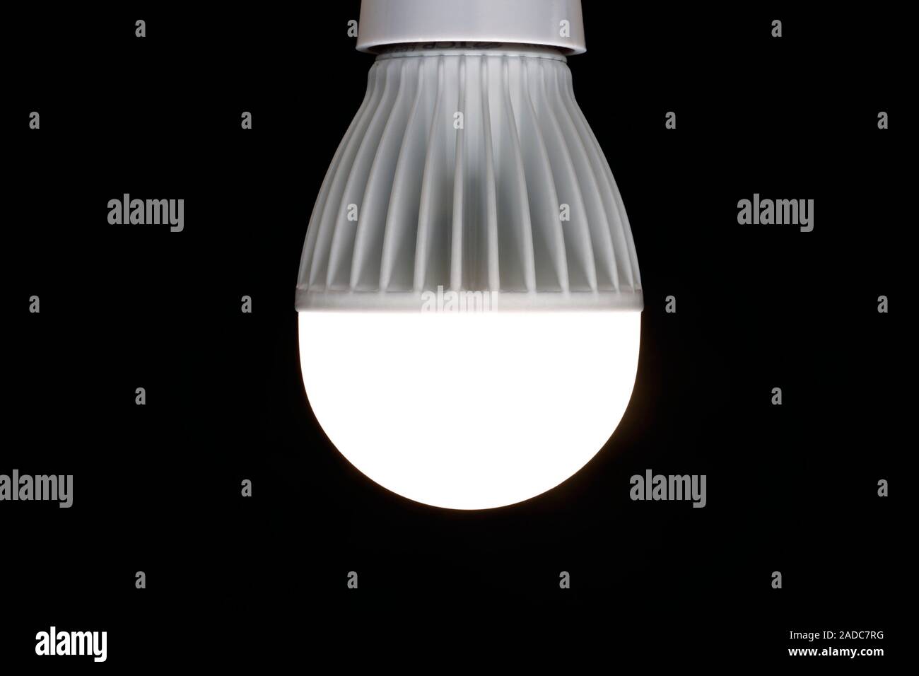 LED light bulb with cooling fins. High-power white light-emitting ...