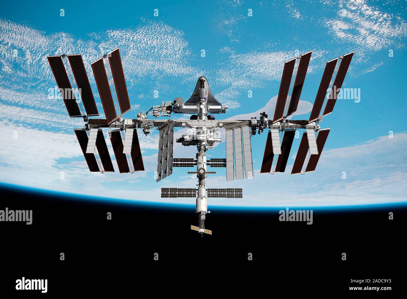 Illustration of a reusable space tourism cruise shuttle docked with the ...