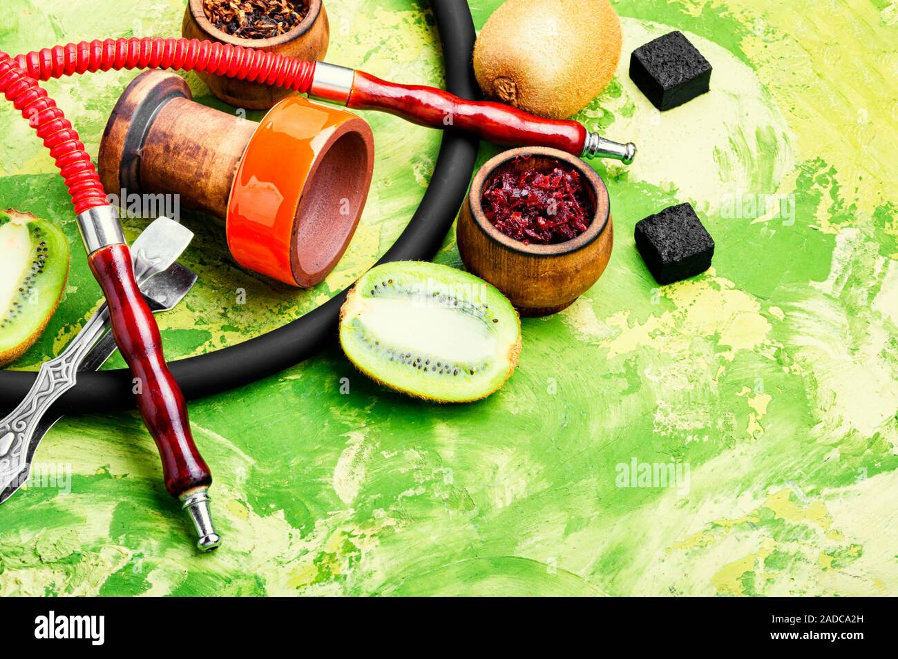 Arabic smoking hookah with taste of kiwi.Fruit shisha tobacco. Tobacco ...