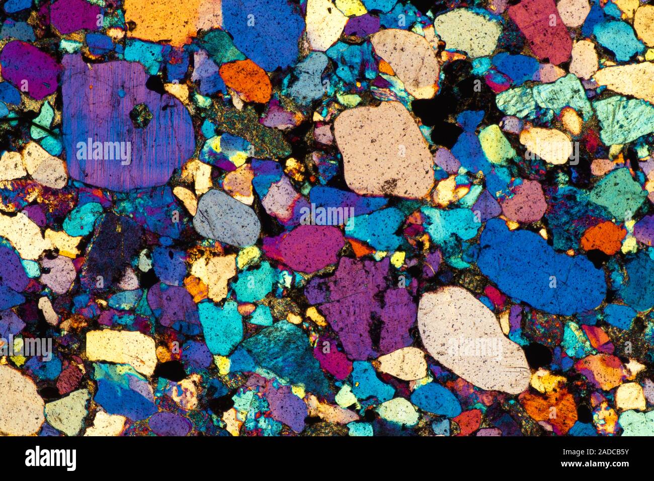 Arkose, polarised light micrograph. Arkose is a detrital sedimentary ...