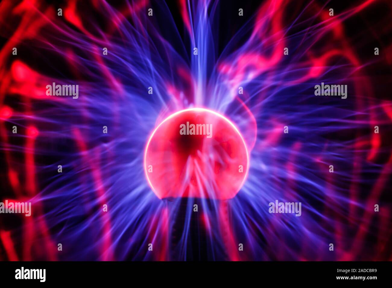 Close-up of a plasma globe showing extremely high-voltage arcs of ...