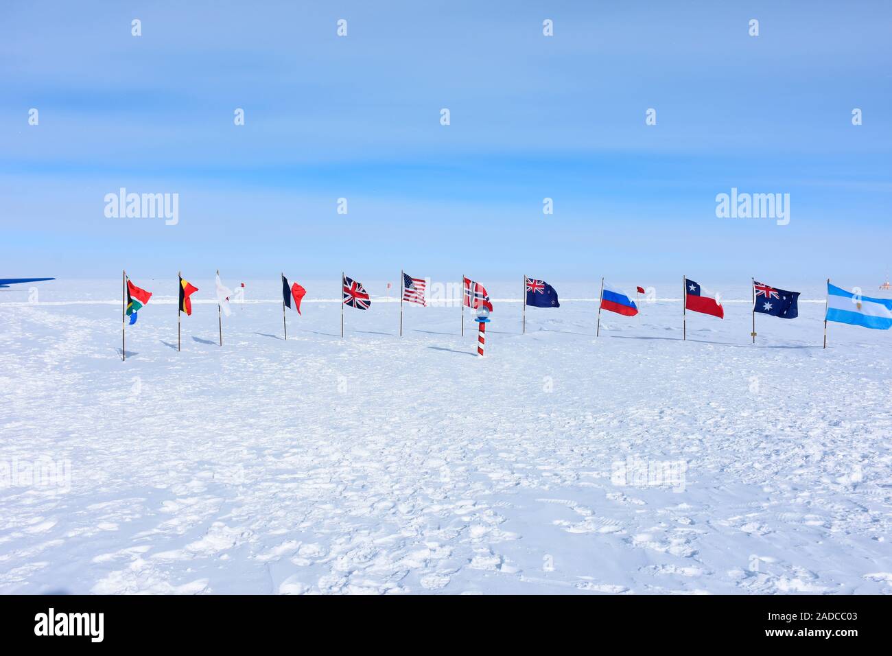 South Pole. The striped pole topped by a reflective ball that marks the ...