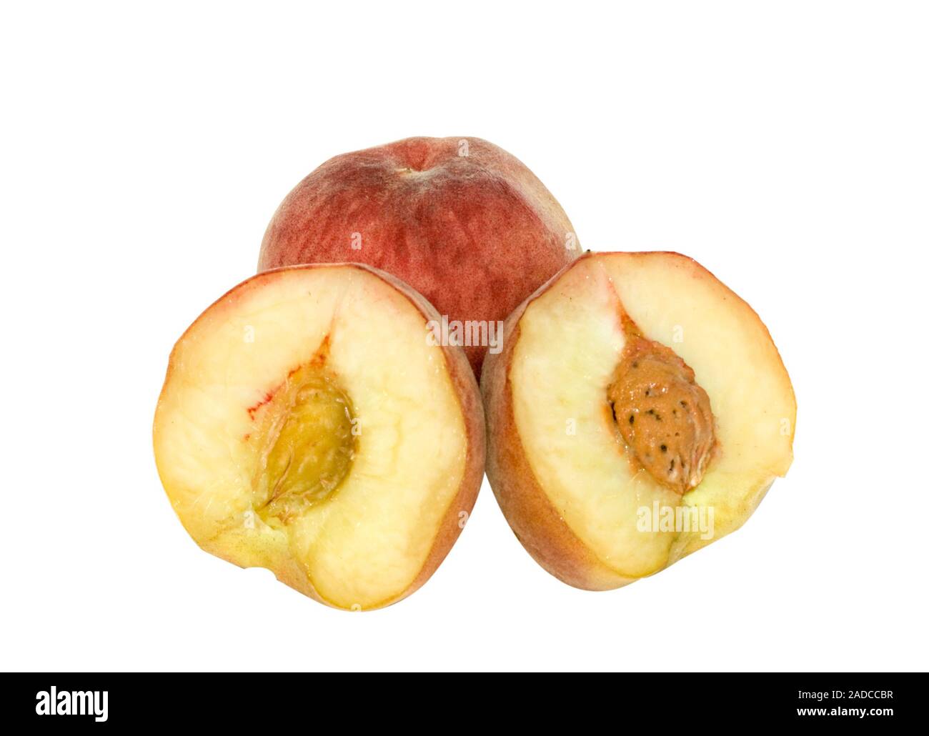 Peach and its section isolated on white background Stock Photo - Alamy