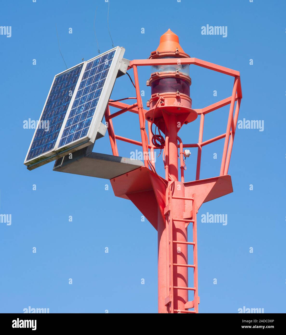 Maritime solar panels powering lights on a tower. This structure is ...