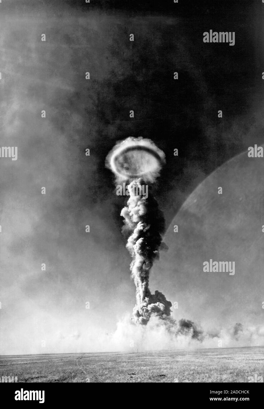 1950s Soviet atom bomb test. Rising mushroom cloud and condensation ...