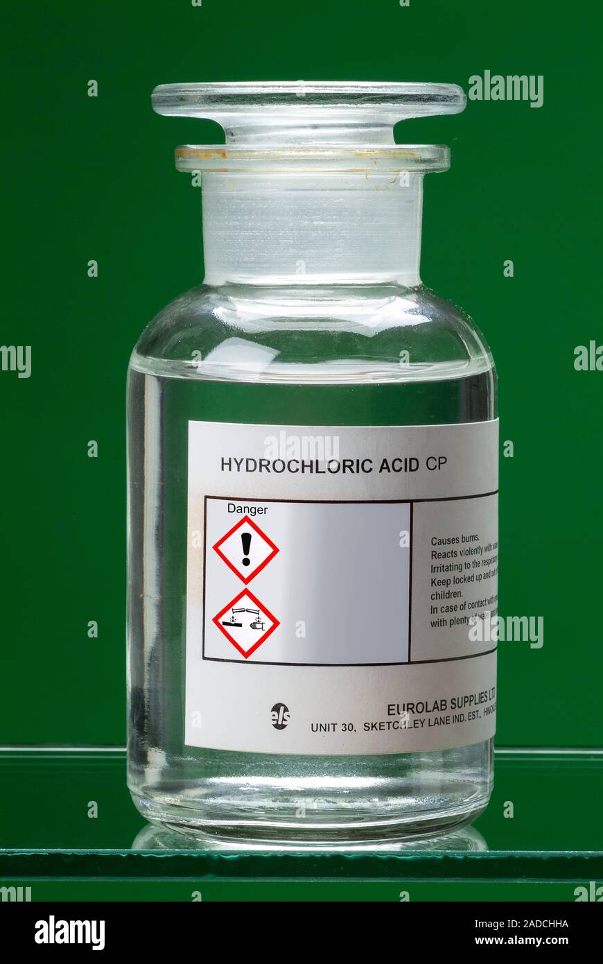 Reagent bottle of hydrochloric acid CP. Under the new UN Globally ...