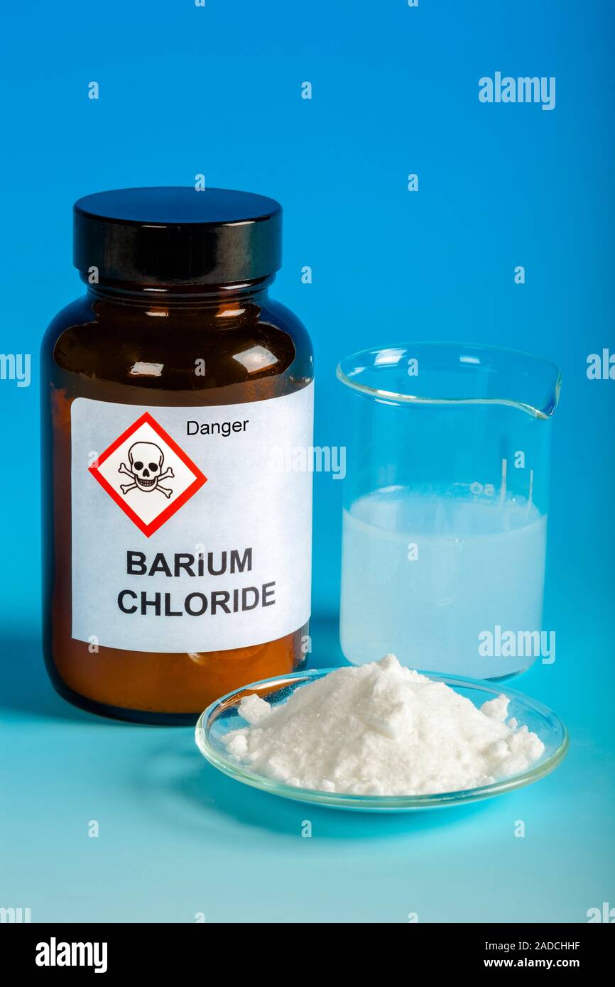 Laboratory jar of the chemical barium chloride (BaCl2), with the solid ...