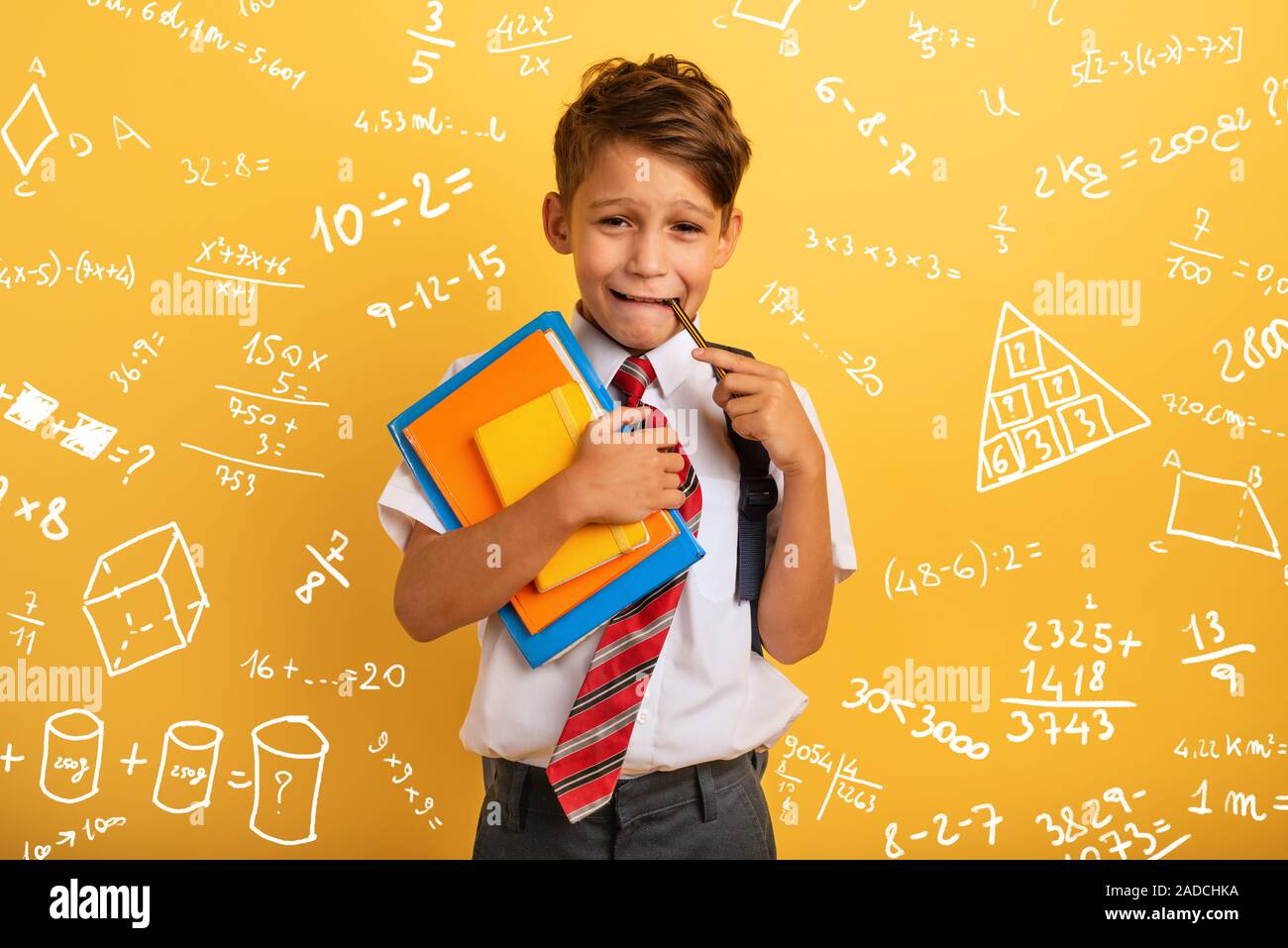 Child cries because he has a lot of school homework. Emotional ...