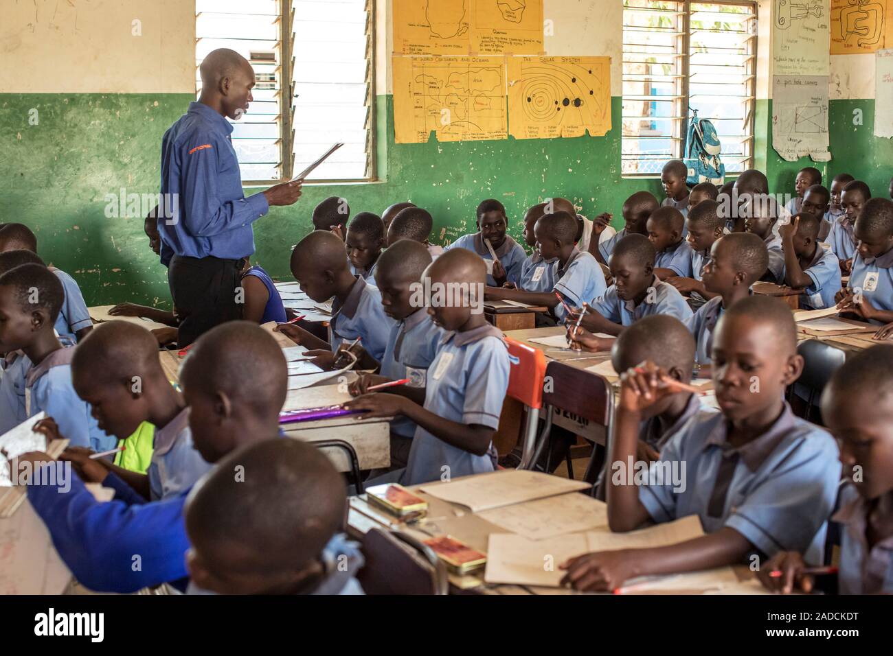School classroom. Schoolchildren and their teacher in a classroom. Photographed in Lacor, Gulu ...