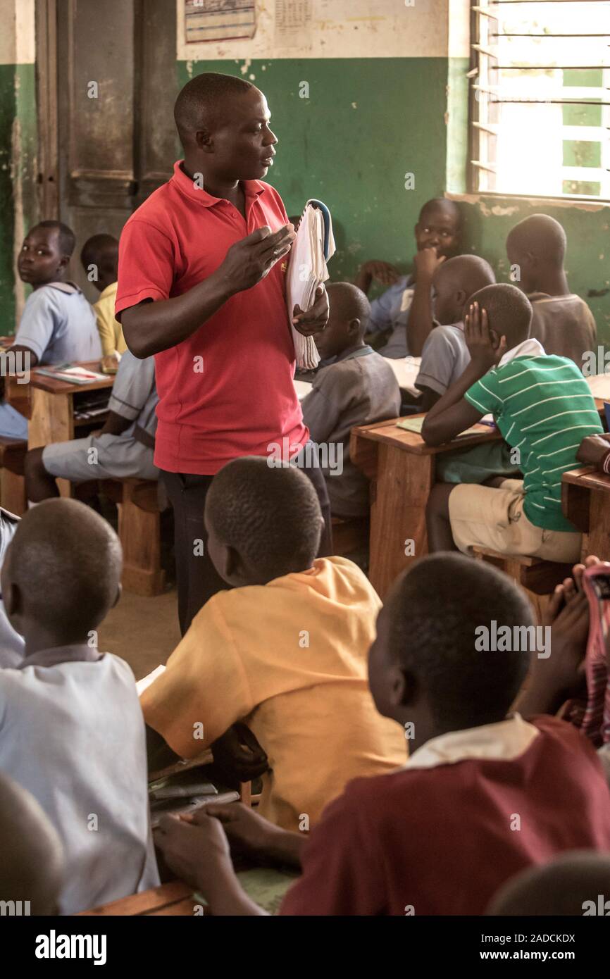 School classroom. Schoolchildren and their teacher in a classroom ...