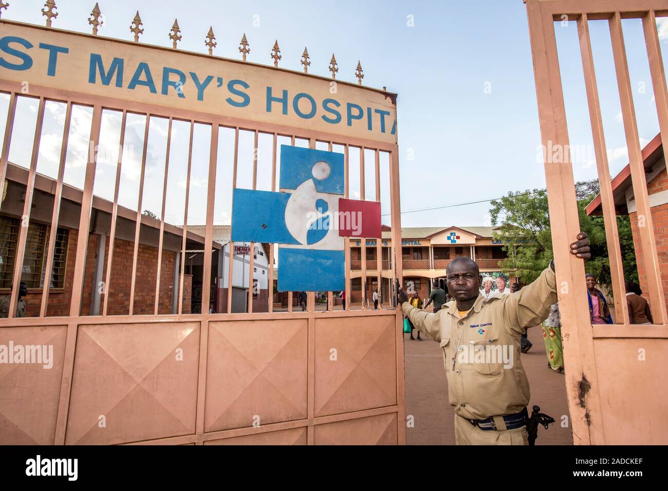 Entrance to St Mary's Hospital, Lacor, Gulu, Uganda. Security guard ...
