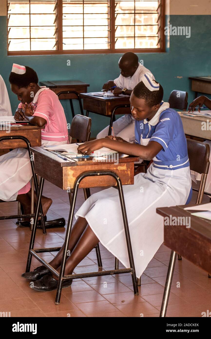 Nursing exam. Student nurses taking a written examination. Photographed ...