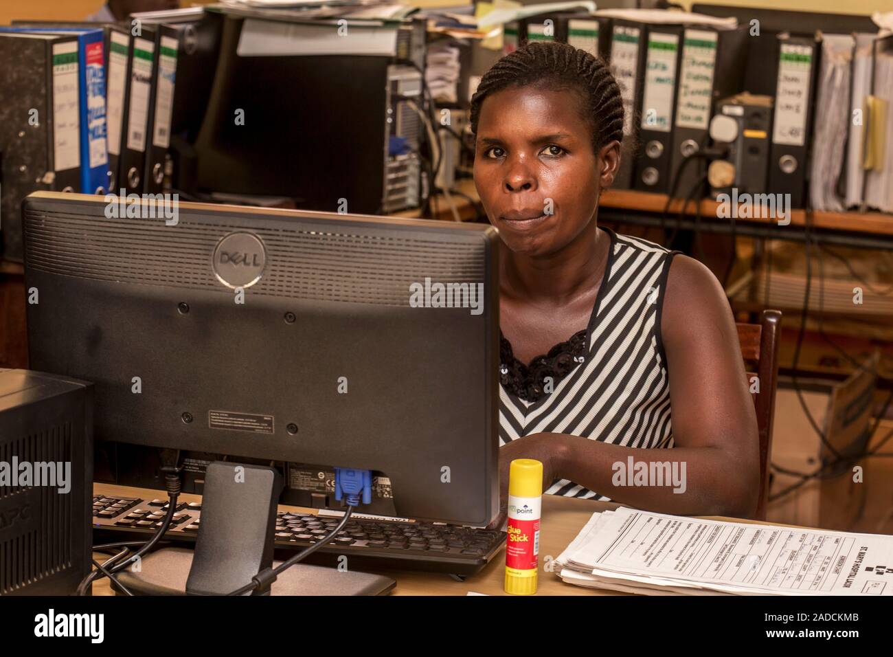 Hospital administrator working at a computer. Photographed in St Mary's ...