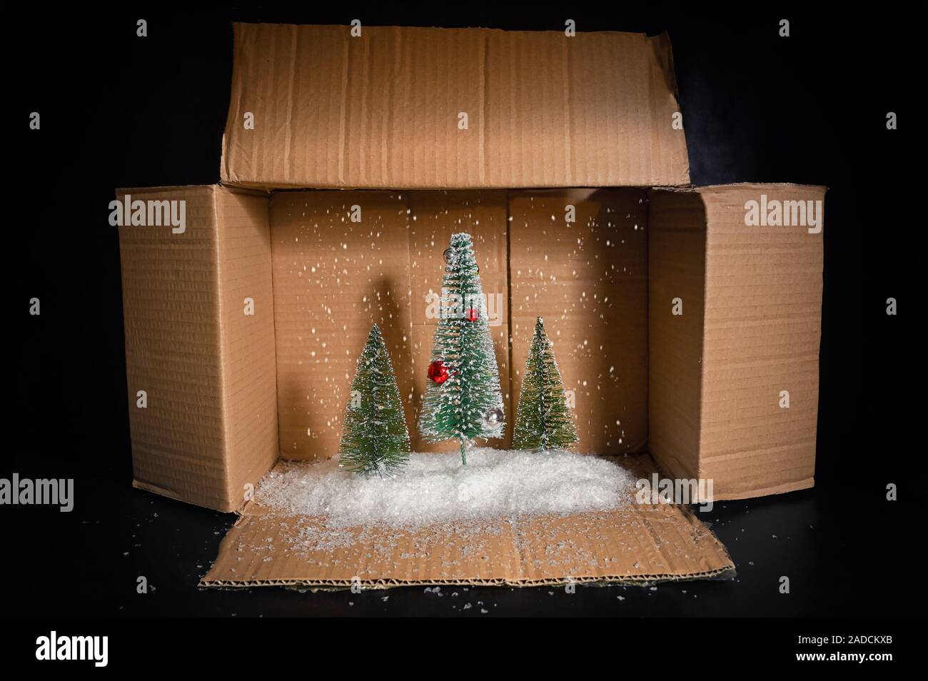 Christmas tree and Snow in Cardboard Box Stock Photo - Alamy