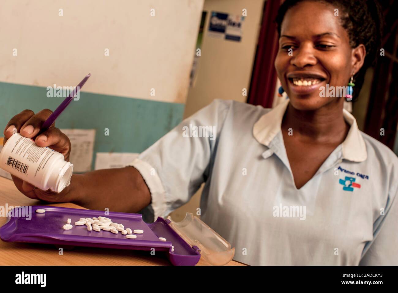 Pharmacist dispensing statins. Hospital pharmacist dispensing tablets ...