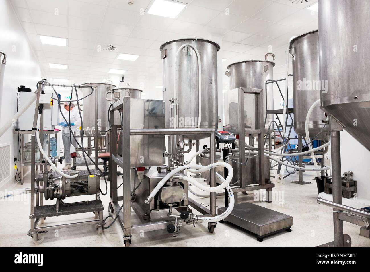 Medical collagen production. Worker in a clean room at a facility that ...