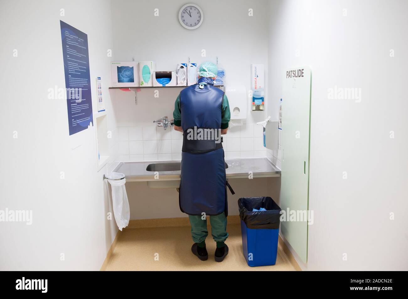 Surgeon washing hands before surgery in a hospital. High standards of ...