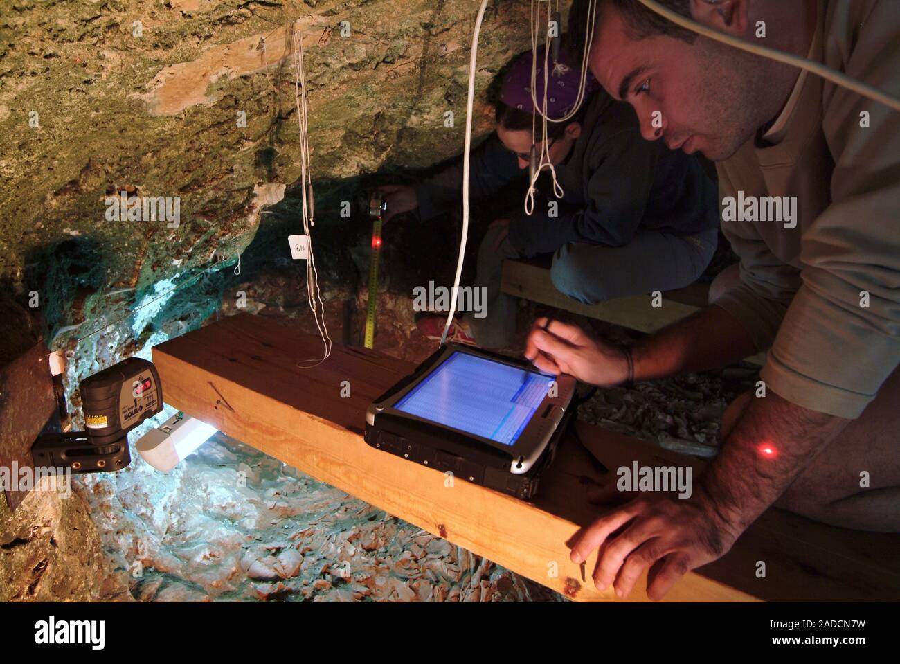 Excavation at the Cova des Pas prehistoric site. Researchers excavating ...