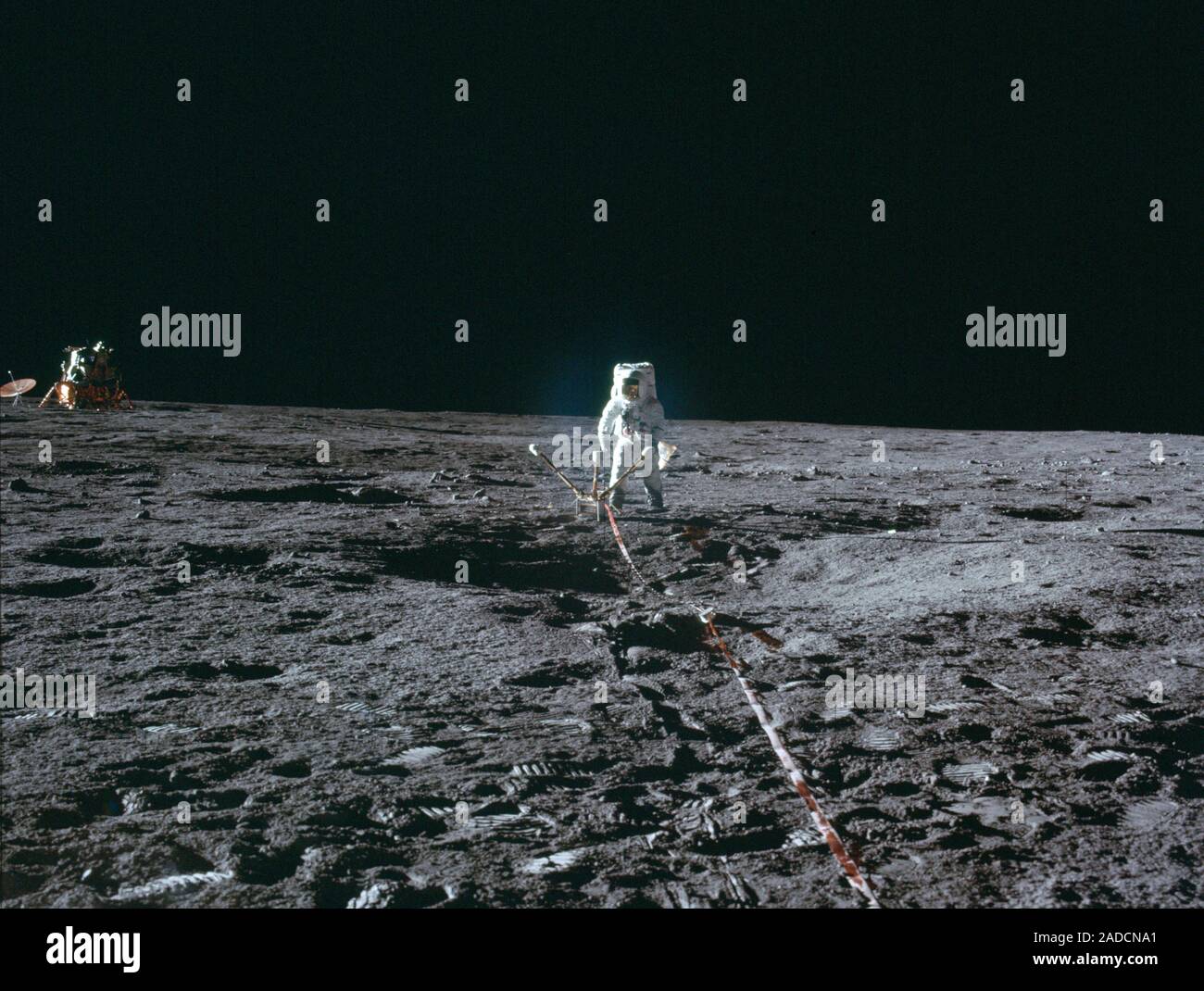Apollo 12 astronaut setting up instruments for the ALSEP (Apollo Lunar ...