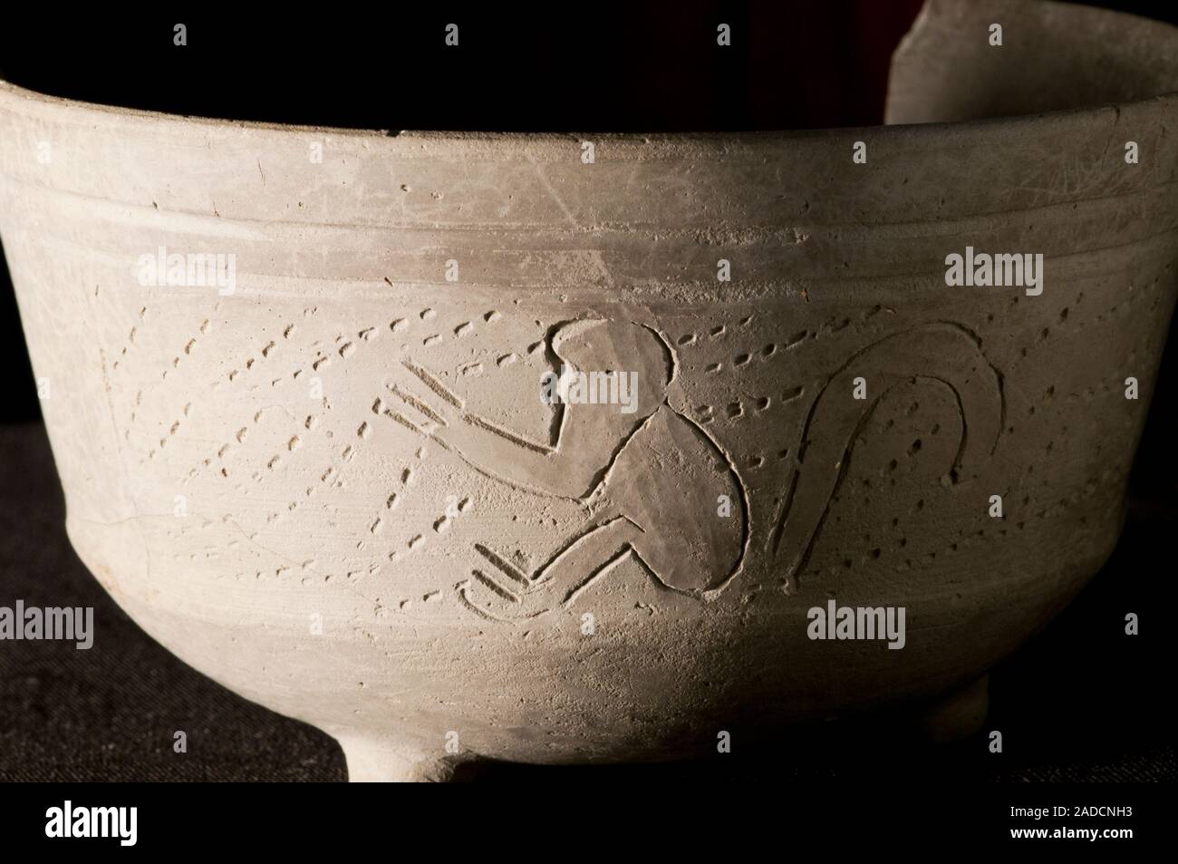 Mayan bowl, with a tripod base and a representation of an ape. This ...