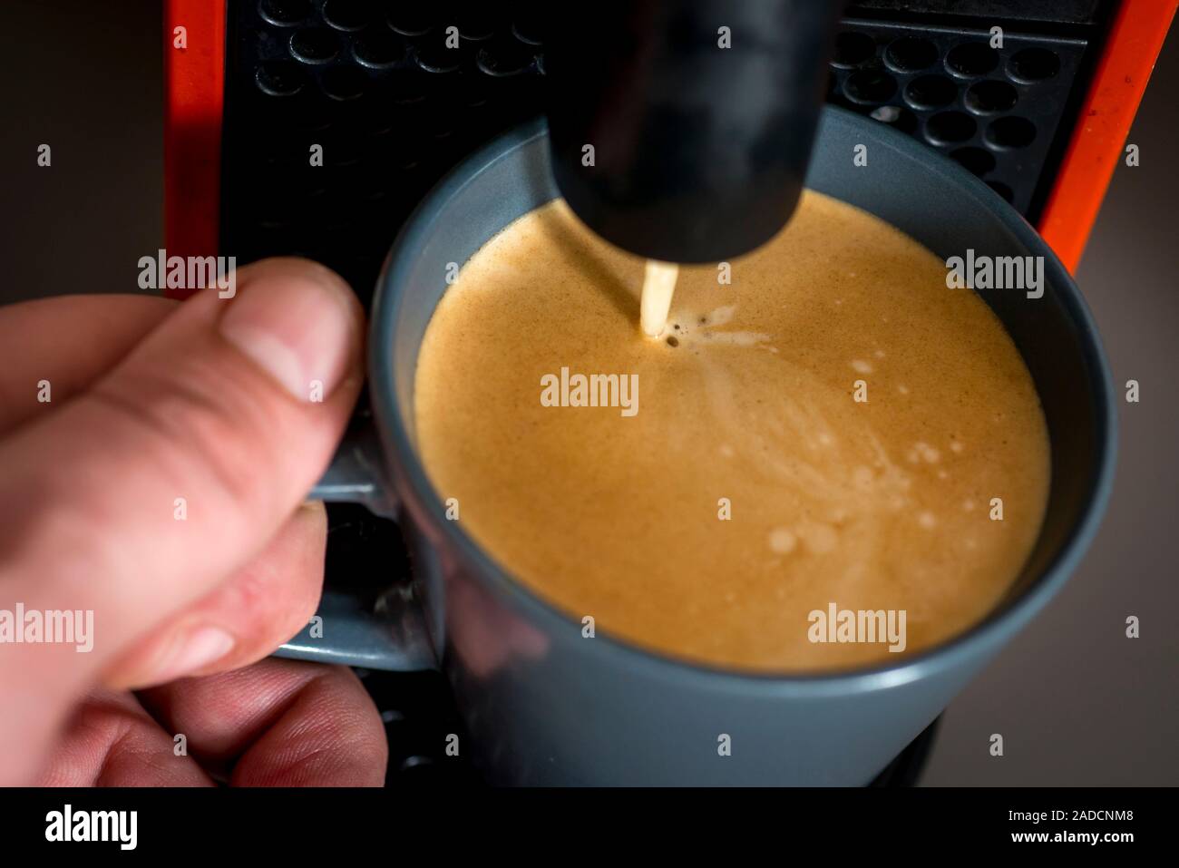A cup of coffee from a coffee machine Stock Photo - Alamy