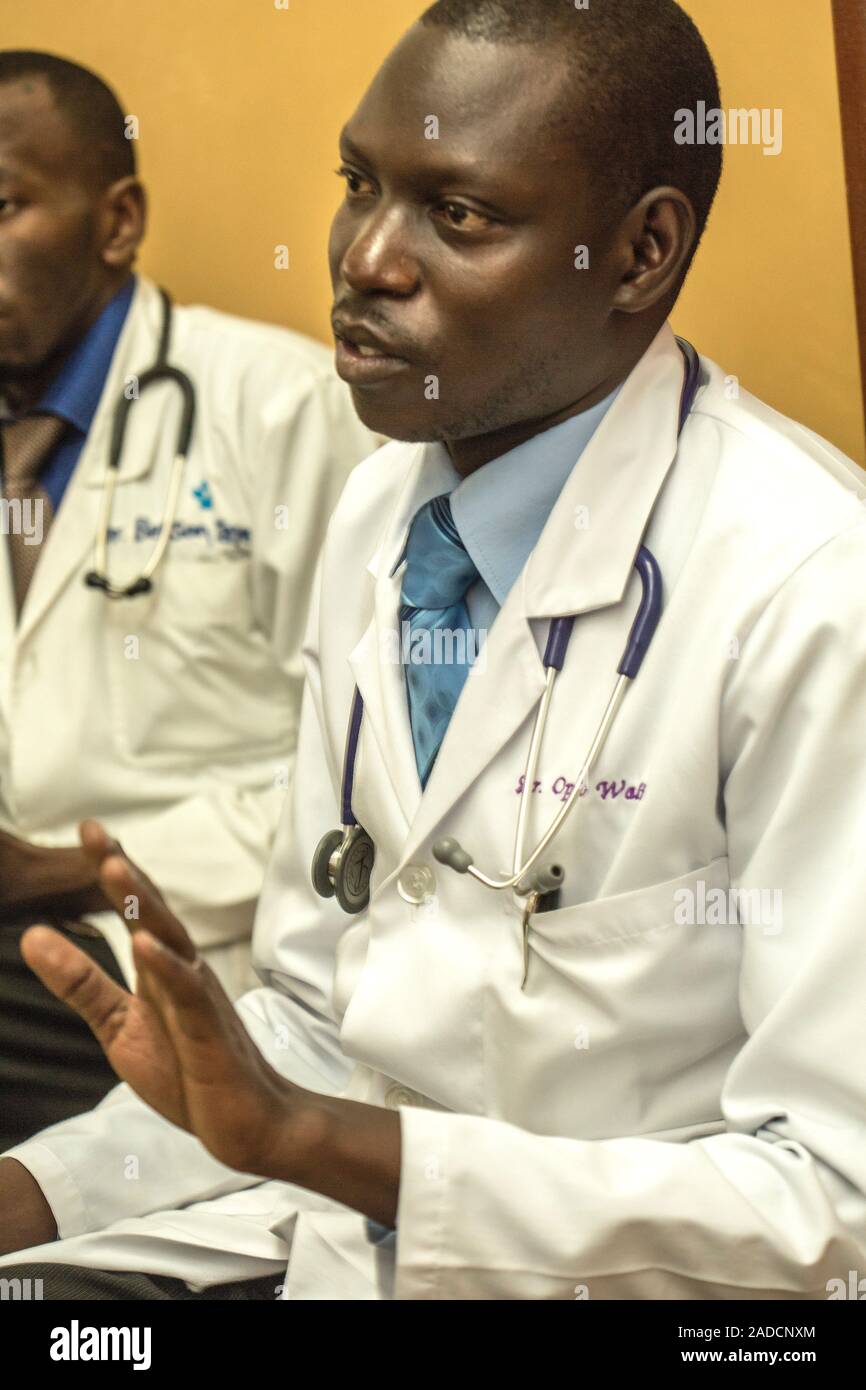 Hospital doctor at a meeting. Photographed in St Mary's Hospital, Lacor ...