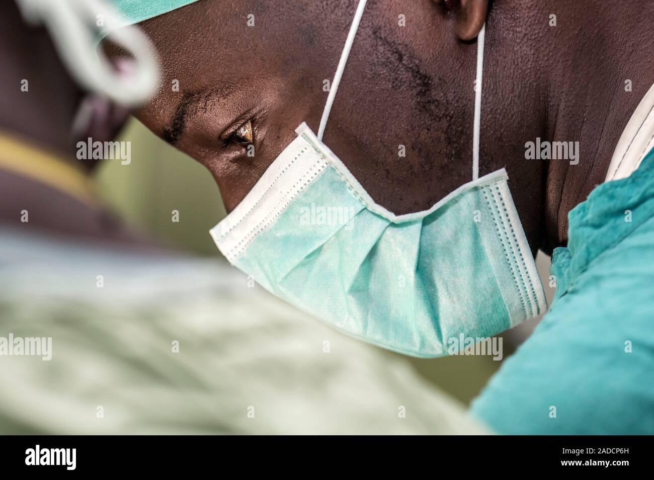 Surgeon operating in a hospital. Photographed at St Mary's Hospital ...