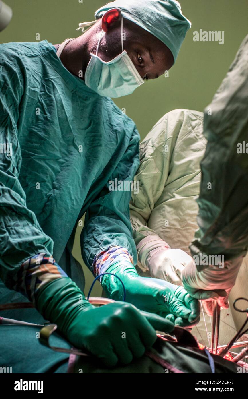 Surgeon operating in a hospital. Photographed at St Mary's Hospital ...