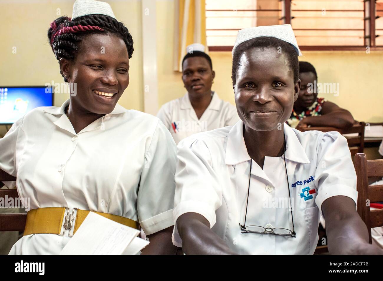 Hospital nurses smiling while at a meeting. Photographed in St Mary's ...