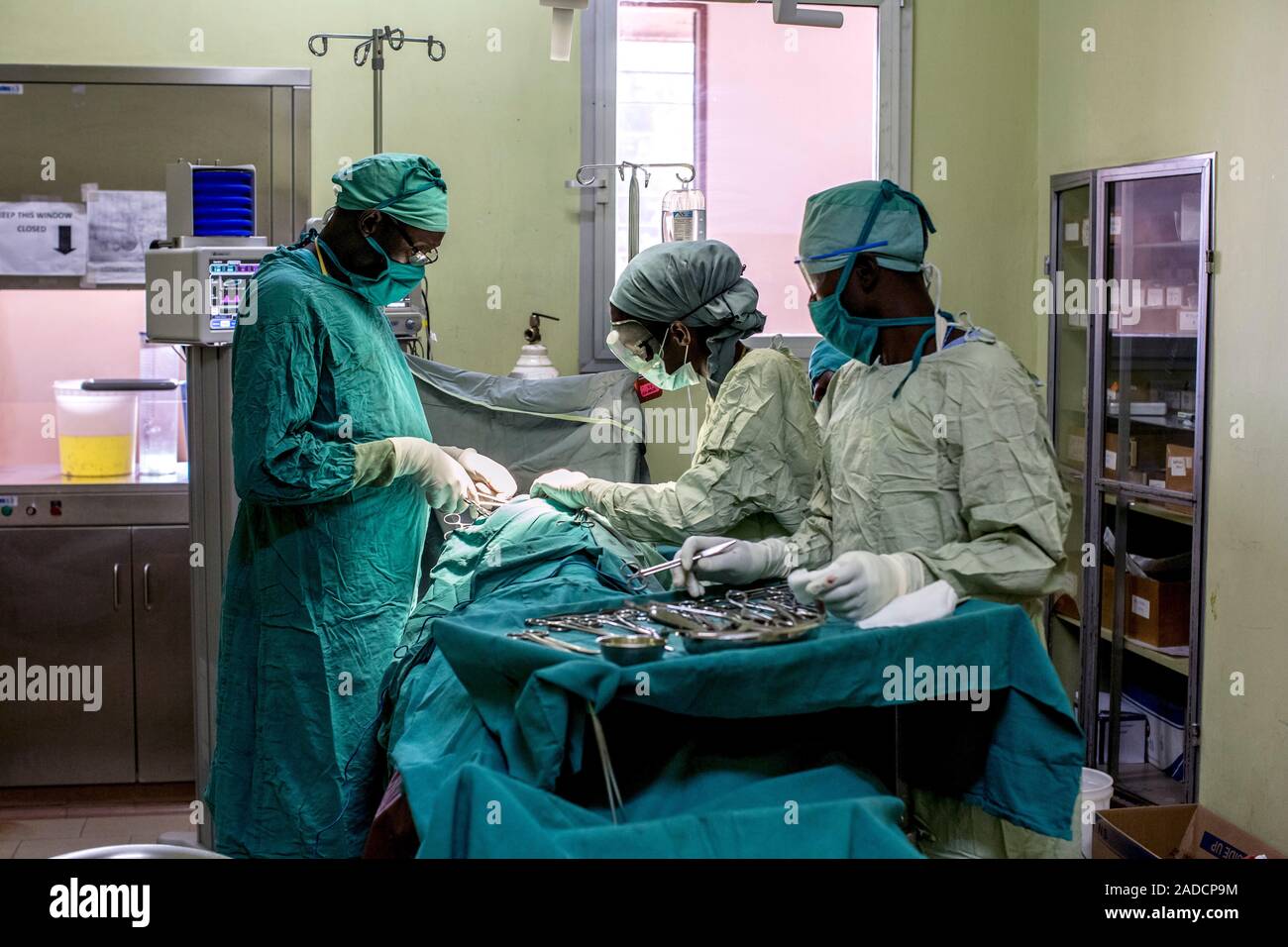 Surgeons operating in a hospital. Photographed at St Mary's Hospital ...