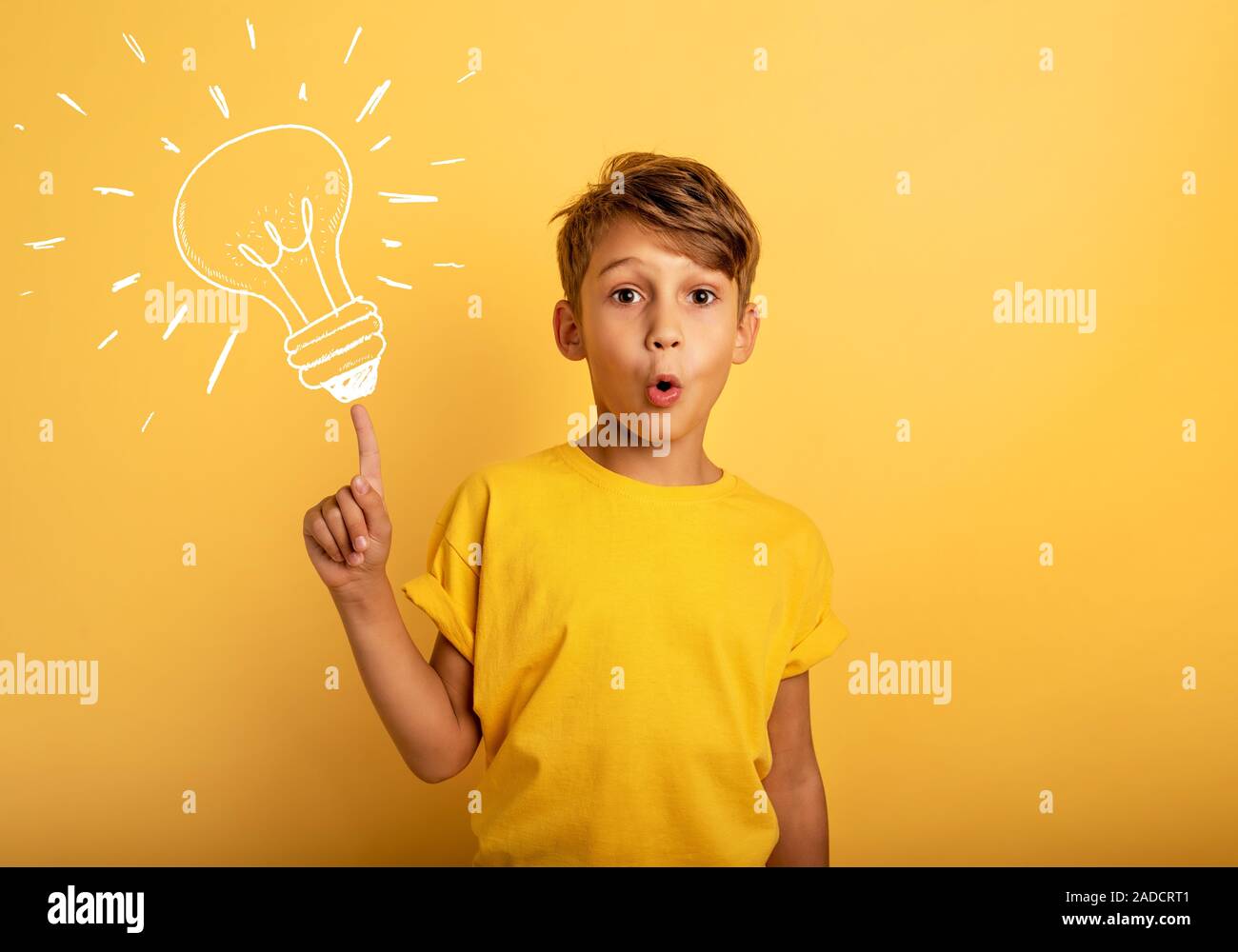 Emotional Child have a big idea. Surprised and amazed face expression ...