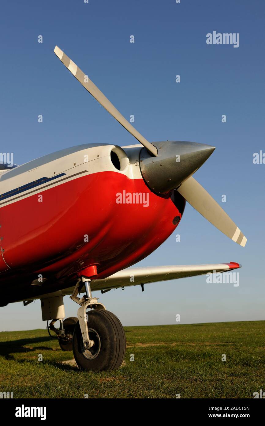 Propellers of Piper PA-28-181 Cherokee Archer III parked on the grass ...