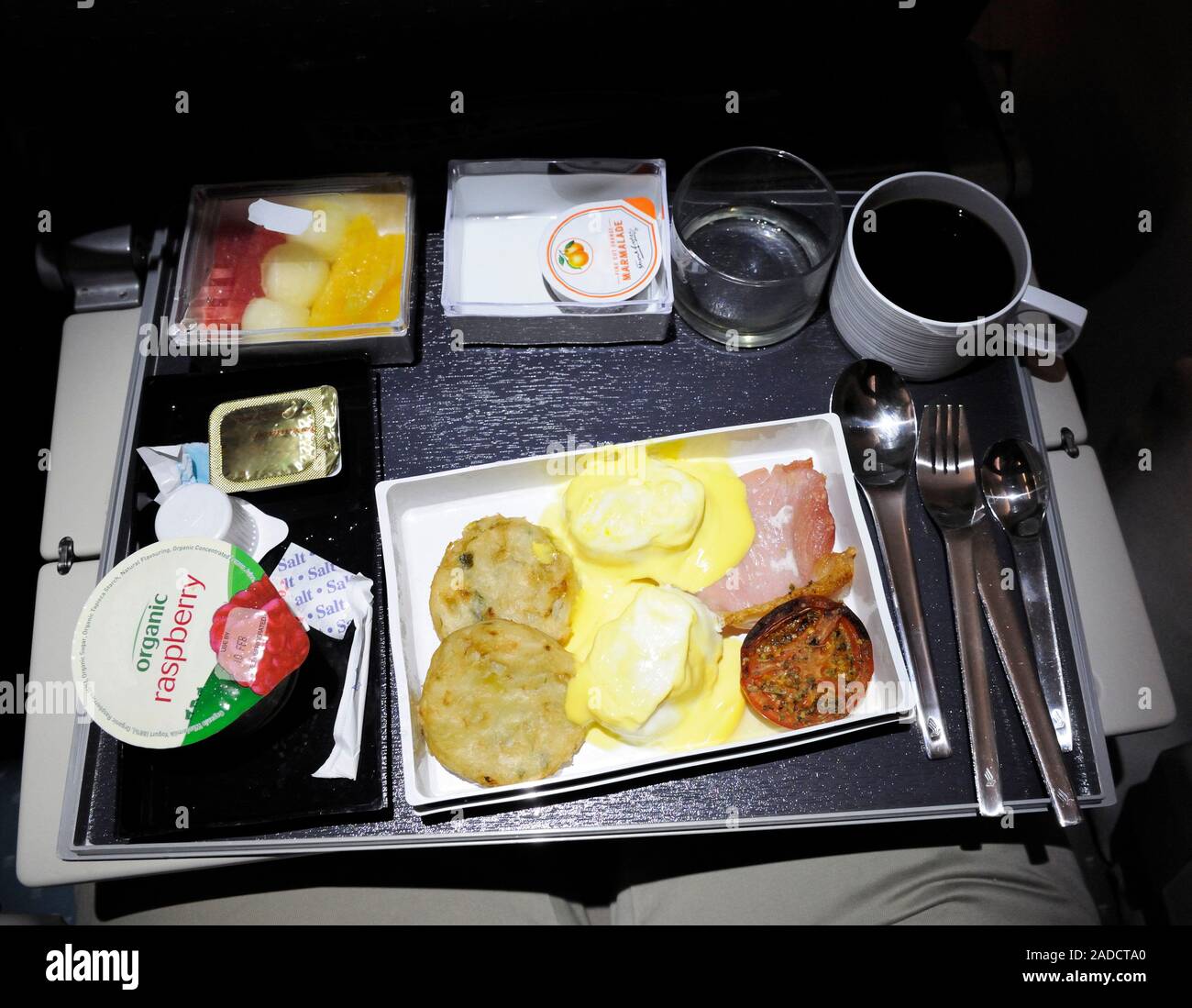 Airline economy class breakfast Stock Photo - Alamy