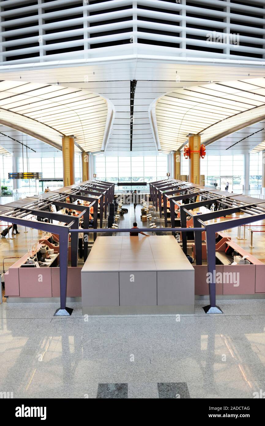 Empty check-in desks in Terminal 2 of Singapore Changi Airport Stock ...
