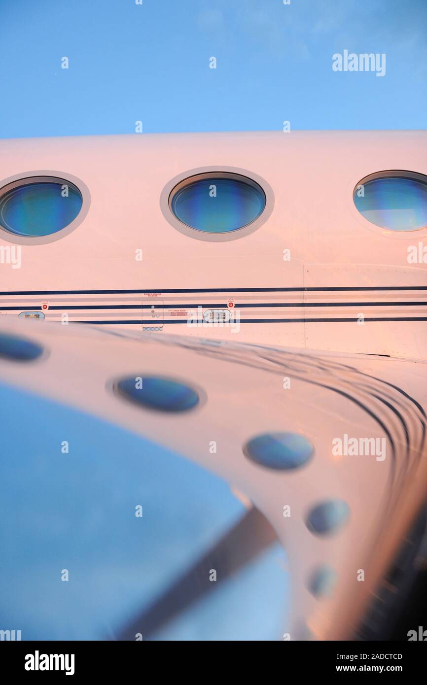 Leading edge of the wing and windows of Gulfstream 450 parked in the ...