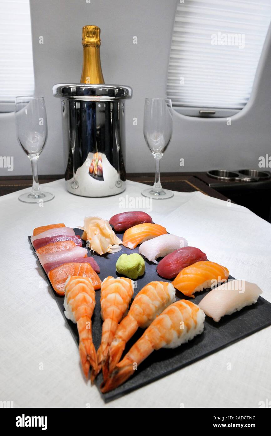 Learjet 45 G-IZIP interior cabin interior with Champagne and sushi ...