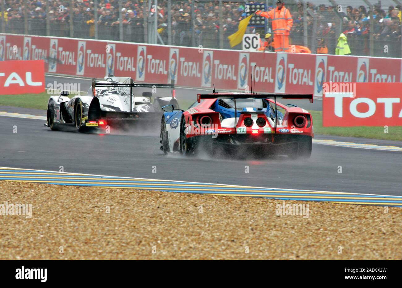 24 Hours of Le Mans, 2016. Ligier JS P2 and Ford GT racing cars being ...